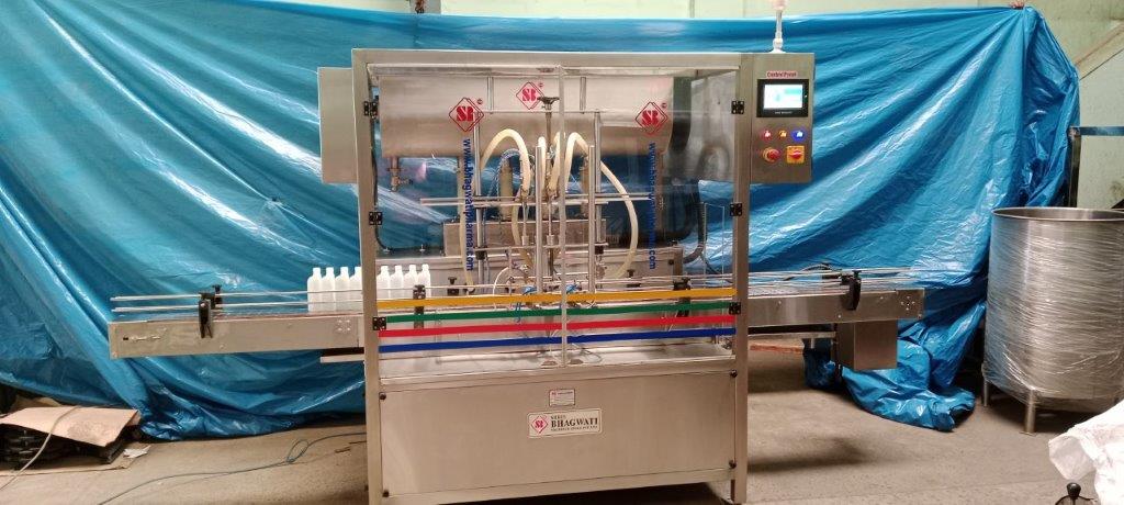 Twin Head, Four Head, Six Head & Eight Head Liquid Filling Machine